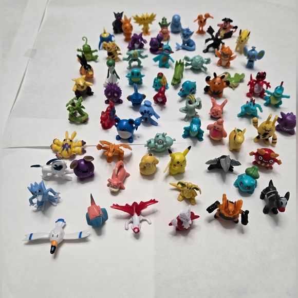 Source Unknown | Toys | 65 Unbranded Mini Pokemon Figures Charizard ...